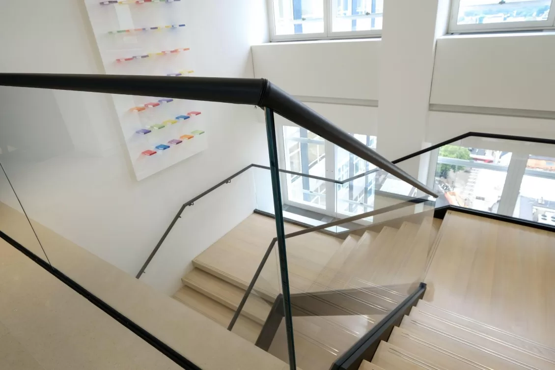 Different balustrade materials within bespoke staircase design
