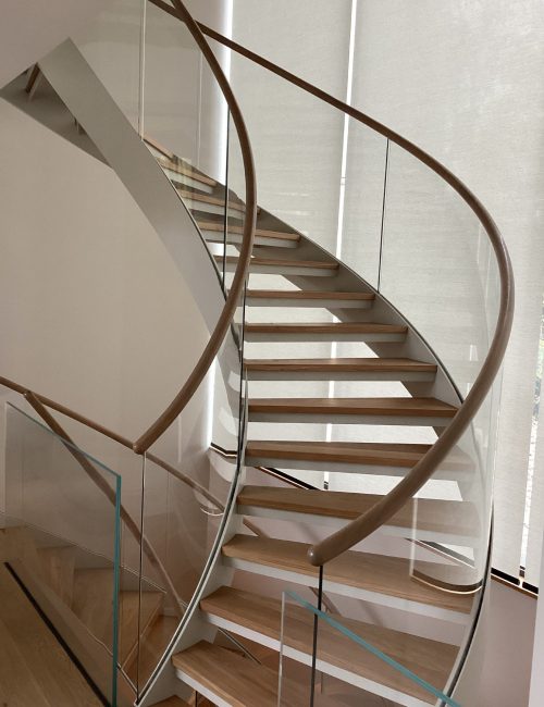 Double flight Helical Staircase with Glass Balustrade